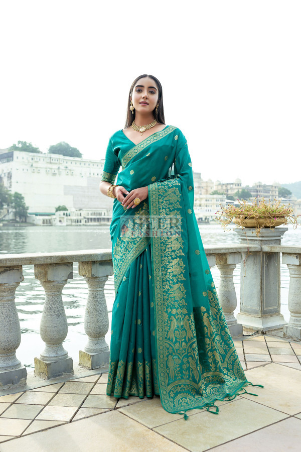 Rama green color soft silk saree with zari weaving work