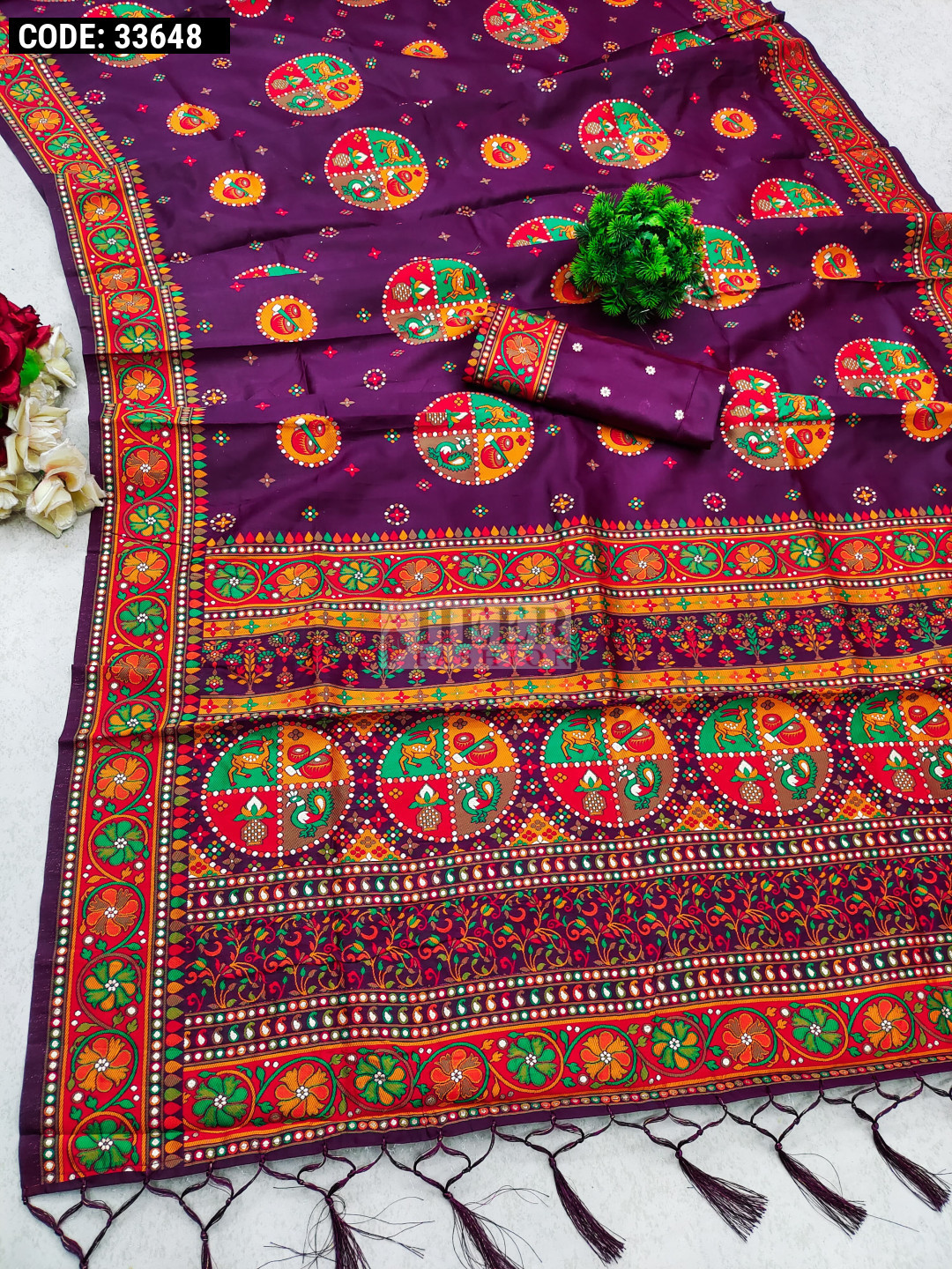 Magenta color pushmina silk saree with weaving work