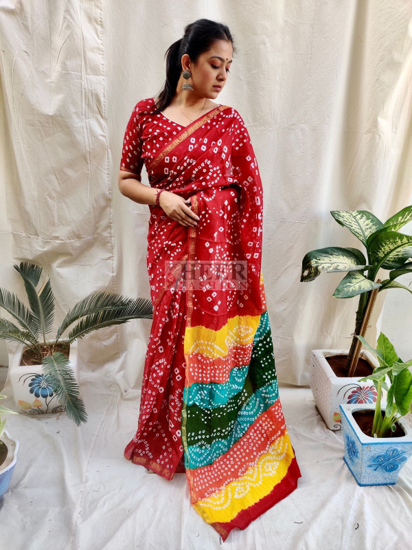 Maroon color bandhani saree with hand bandhej print