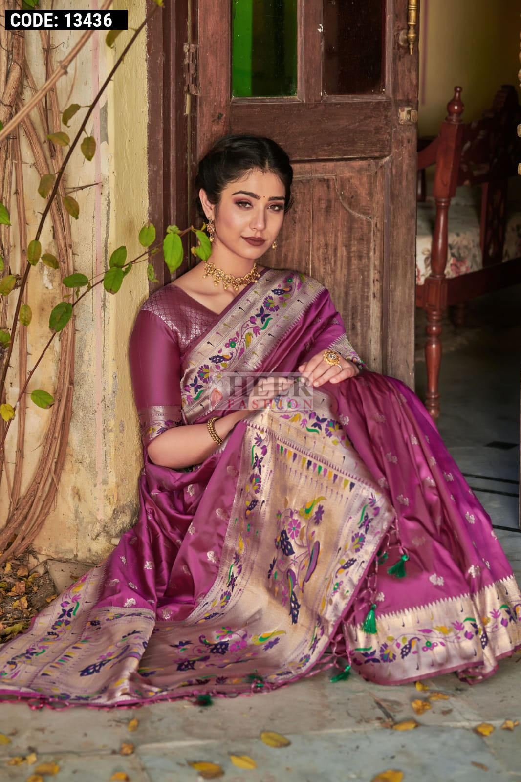 Magenta color paithani silk saree with zari woven work