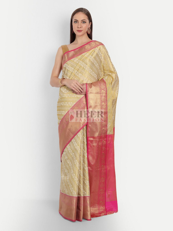 Off white color kanchipuram silk saree with zari woven work