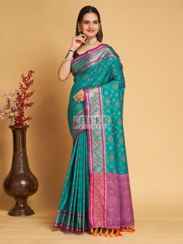Rama green color patola silk saree with weaving work