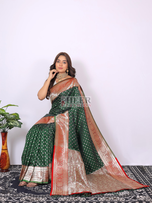 Bottle green color banarasi silk saree with zari weaving work