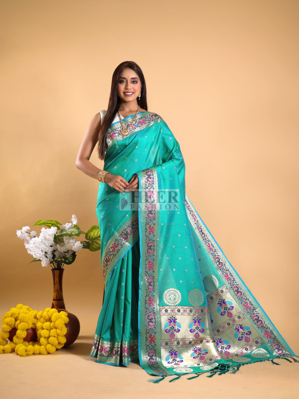 Rama green color paithani silk saree with zari weaving work