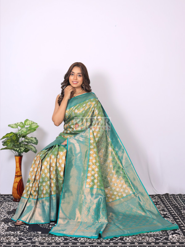 Mahendi green color banarasi silk saree with zari weaving work