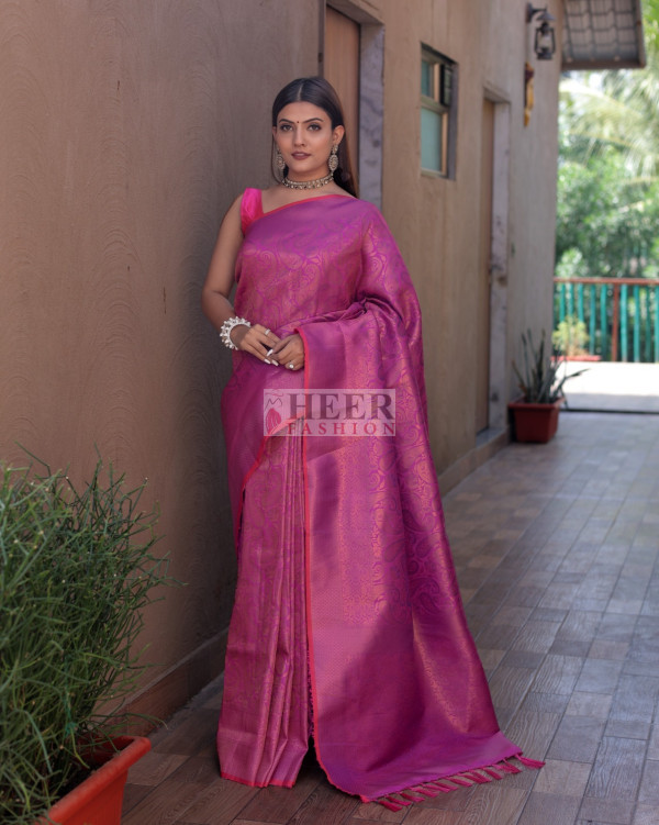 Rani pink color kanchipuram silk saree with zari woven work