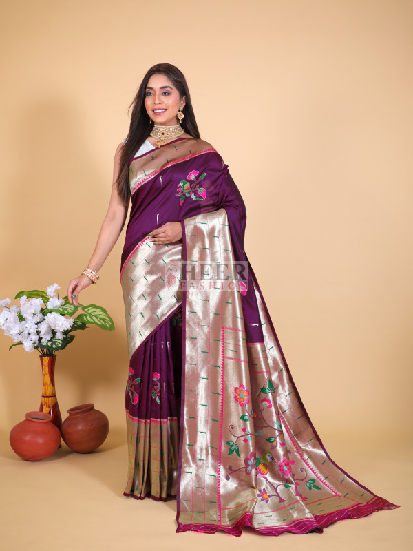 Magenta color paithani silk saree with zari weaving work