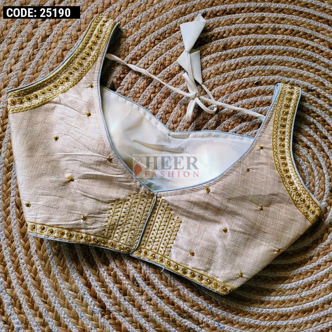 Fancy embroidery design work off white color blouse