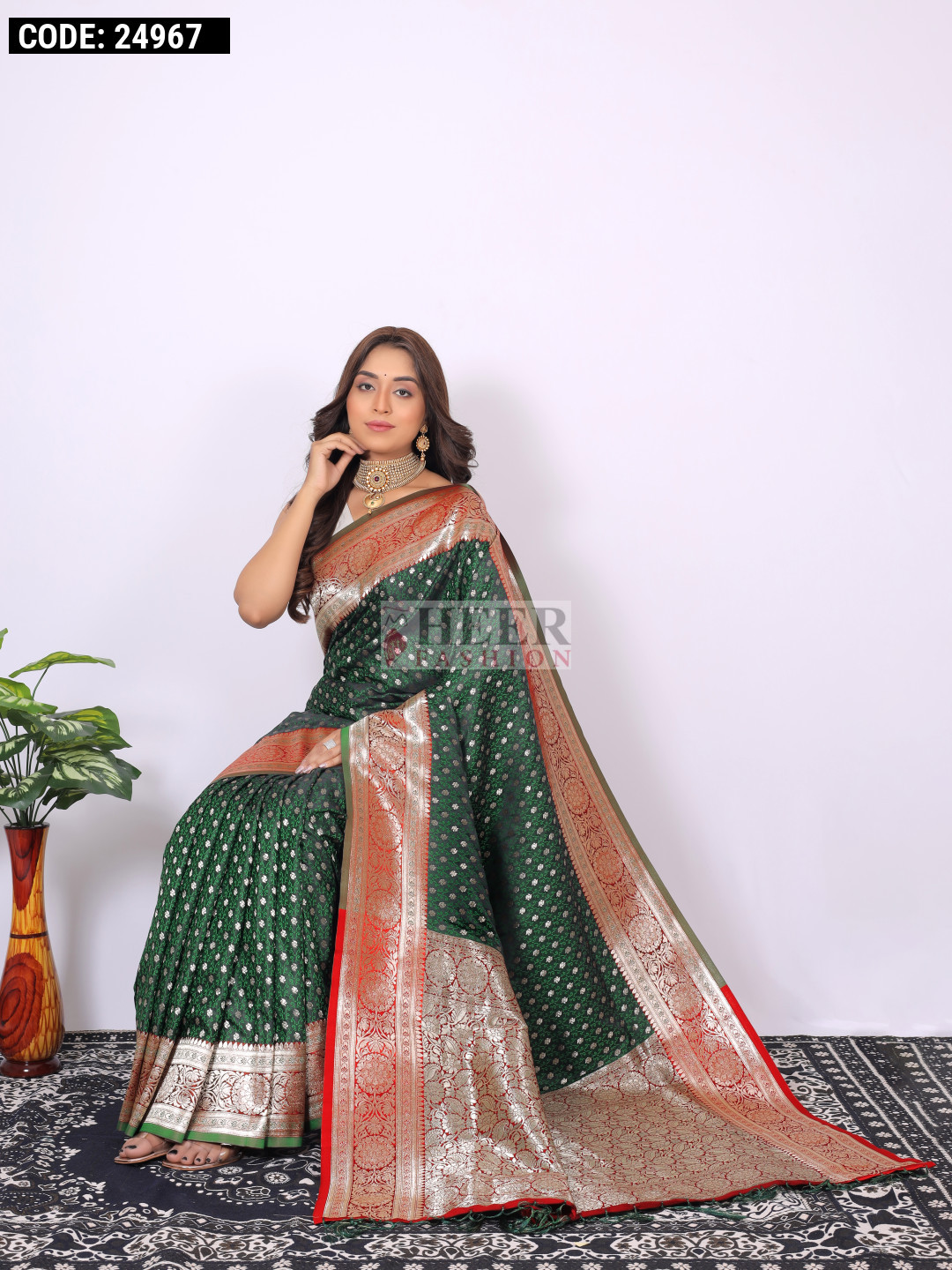 Bottle green color banarasi silk saree with zari weaving work