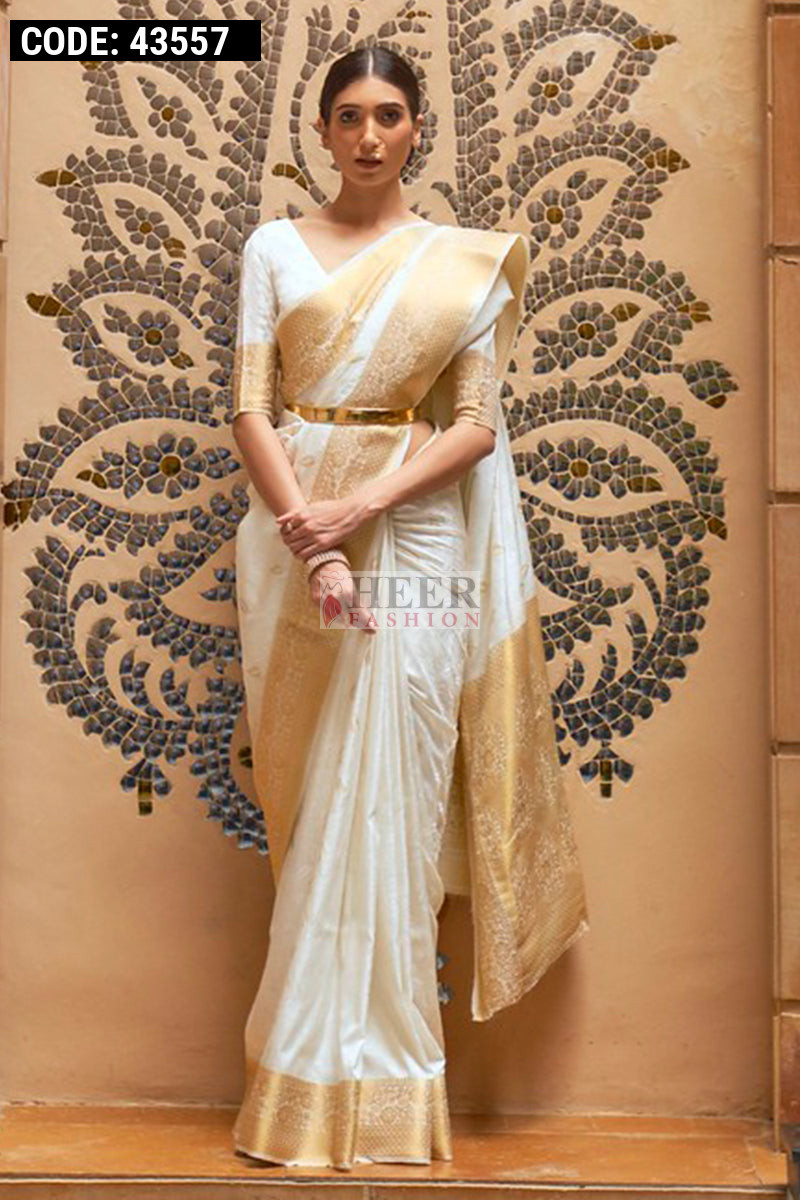 Off white soft banarasi silk saree with zari weaving work