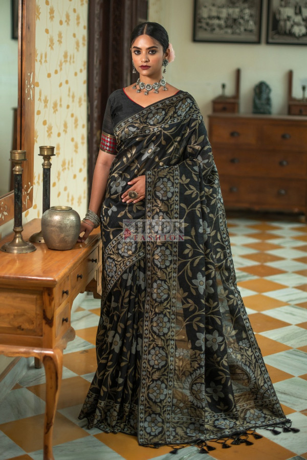 Black color tussar silk saree with zari woven border
