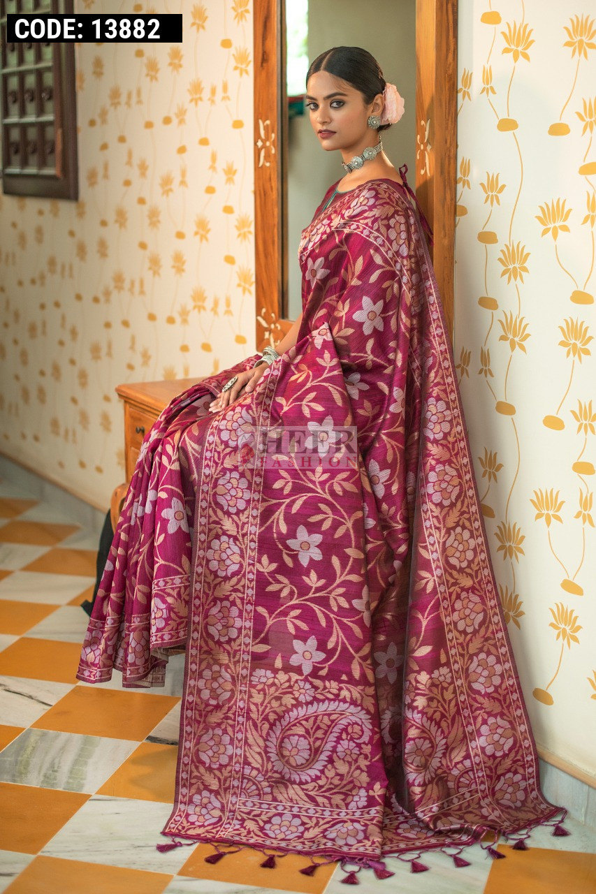 Magenta color tussar silk saree with zari woven border
