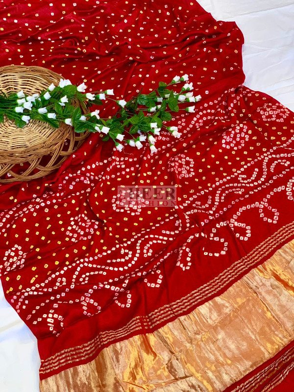 Red color soft hand bandhej gajji silk saree with zari weaving work