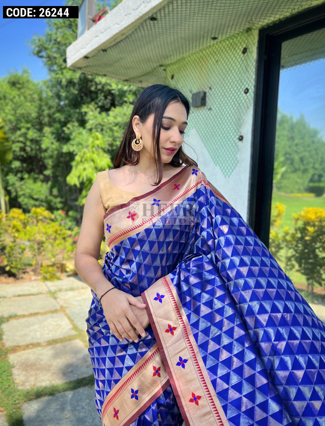 Navy blue color paithani silk saree with zari weaving work