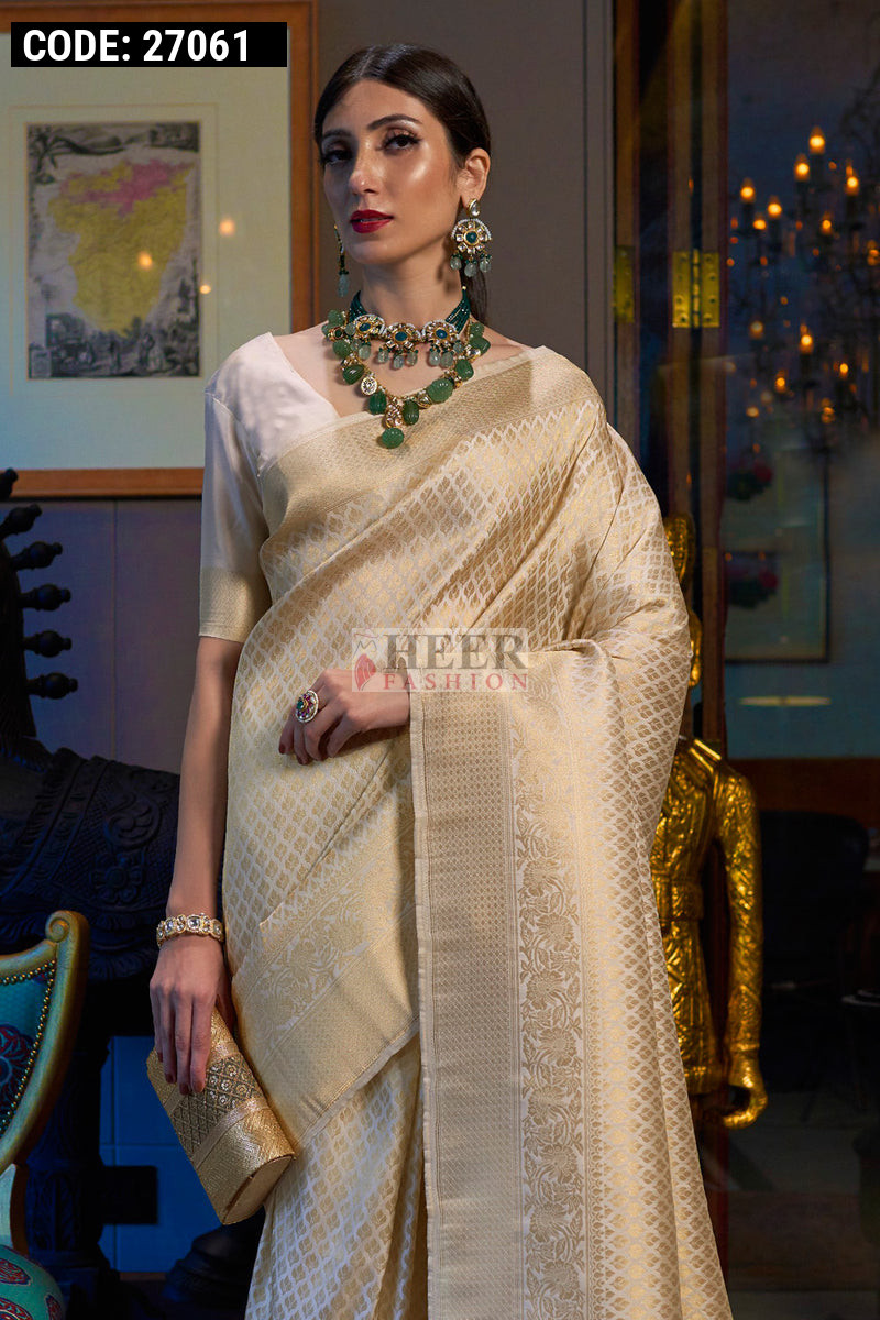 Off white color kanchipuram silk saree with zari weaving work