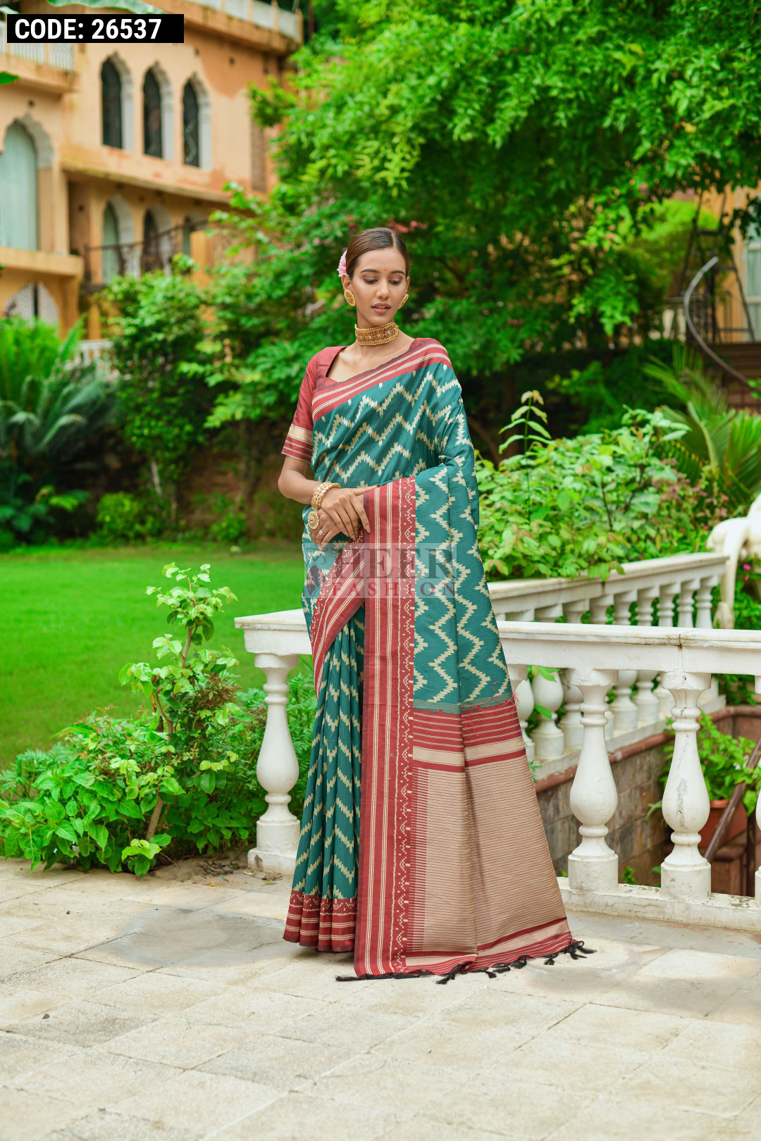 Rama green color soft raw silk saree with woven design