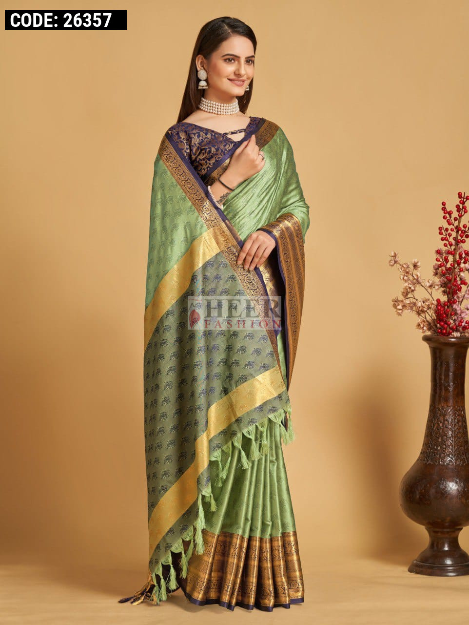 Light green color cotton silk saree with woven design
