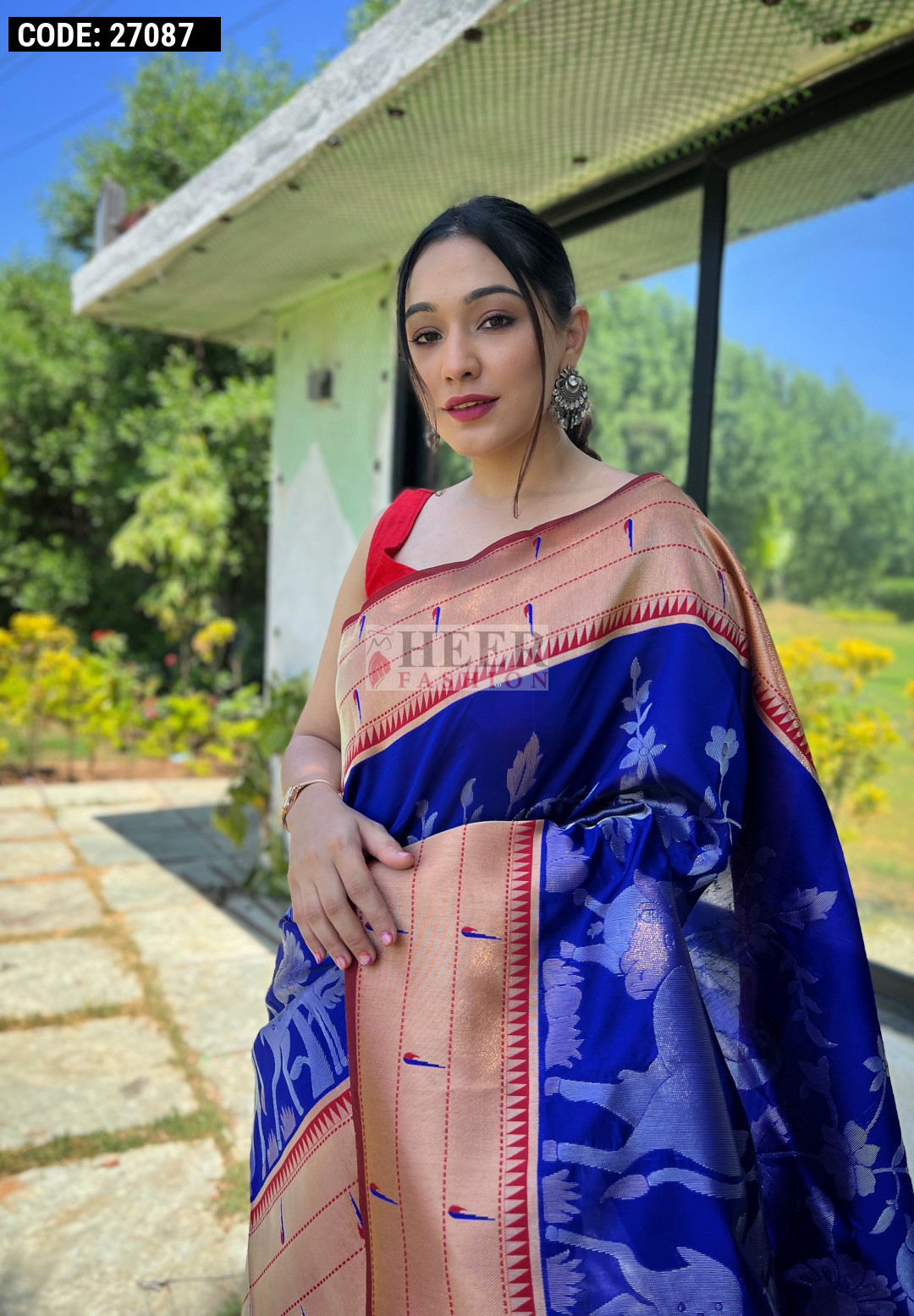 Royal blue color paithani silk saree with zari weaving work