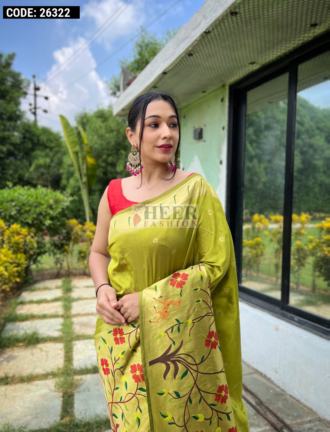 Mahendi green color paithani silk saree with zari weaving work