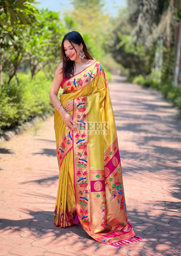 Yellow color soft tissue paithani silk saree with zari weaving work