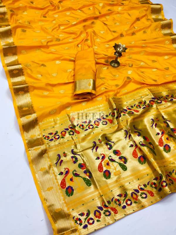Yellow color paithani silk saree with zari weaving work