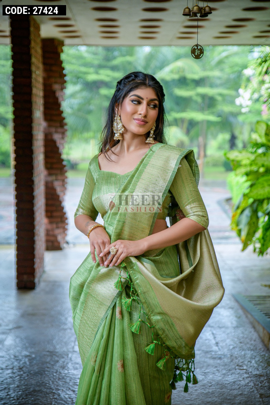 Pista green color tussar silk saree with zari weaving work