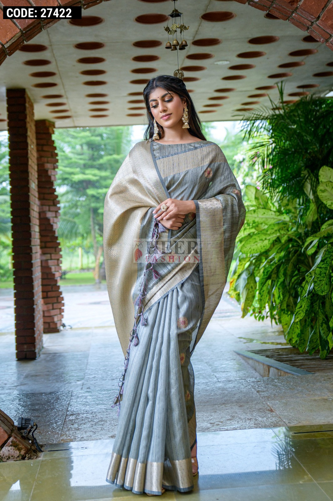 Gray color tussar silk saree with zari weaving work