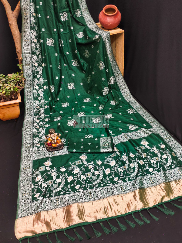 Flowy woven design with lagdi patta pallu bottle green color dola silk ...