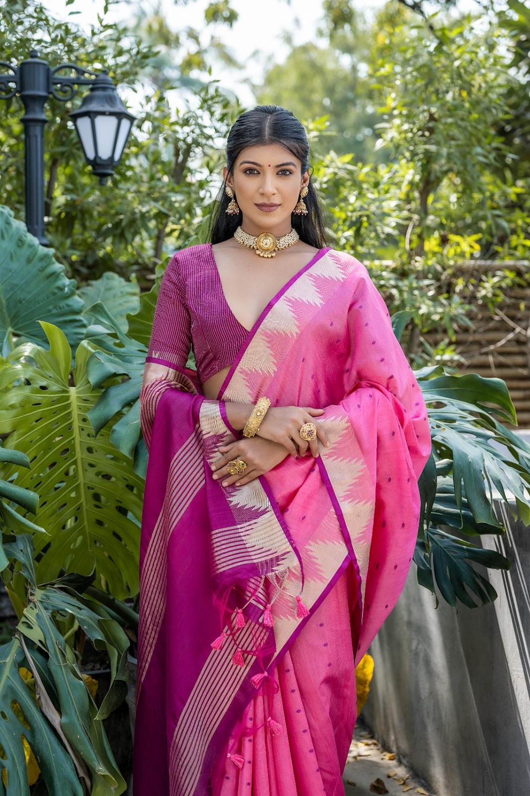 Baby pink color tussar silk saree with zari weaving temple border