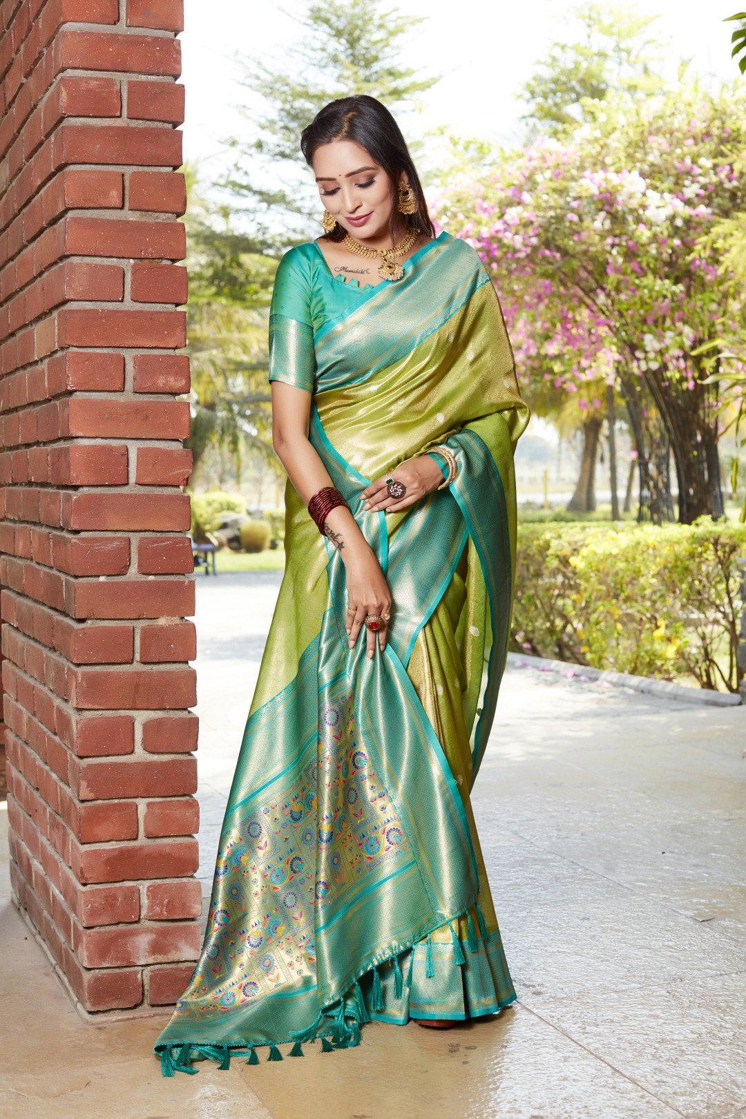 Parrot green flowy tissue kanjivaram silk saree with contrast woven ...