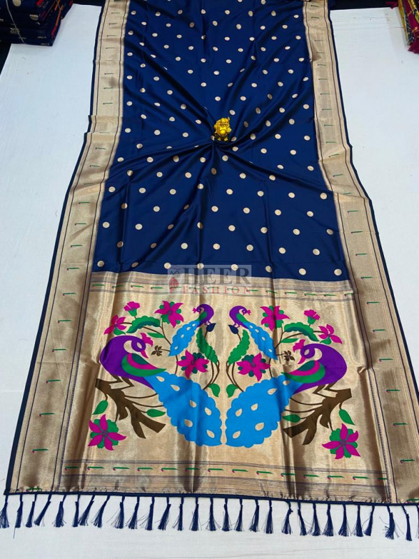 Navy blue color paithani silk saree with golden zari weaving work