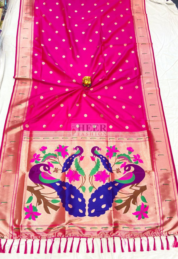 Rani pink color paithani silk saree with golden zari weaving work