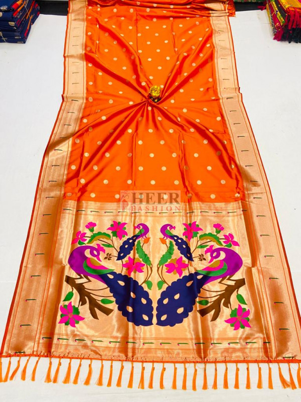 Orange color paithani silk saree with golden zari weaving work
