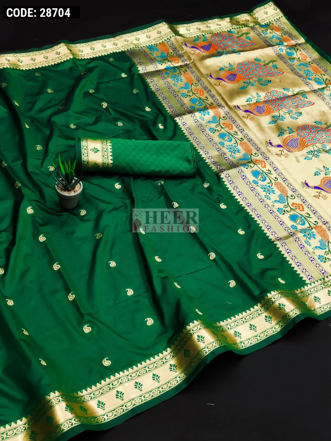 Dark green color paithani silk saree with zari weaving work
