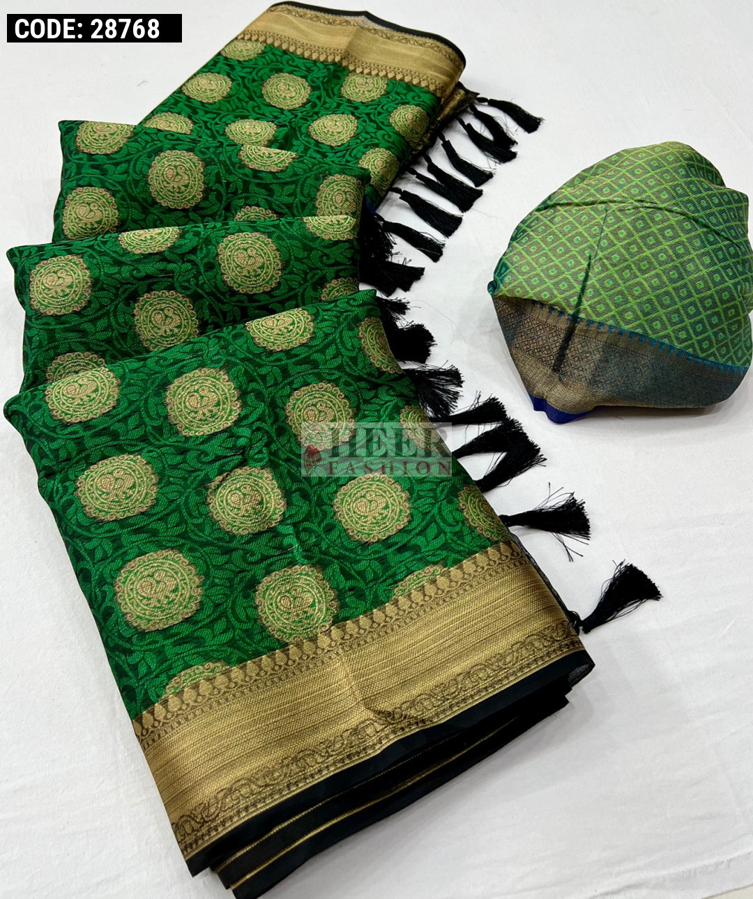 Green color kora muslin silk saree with woven design