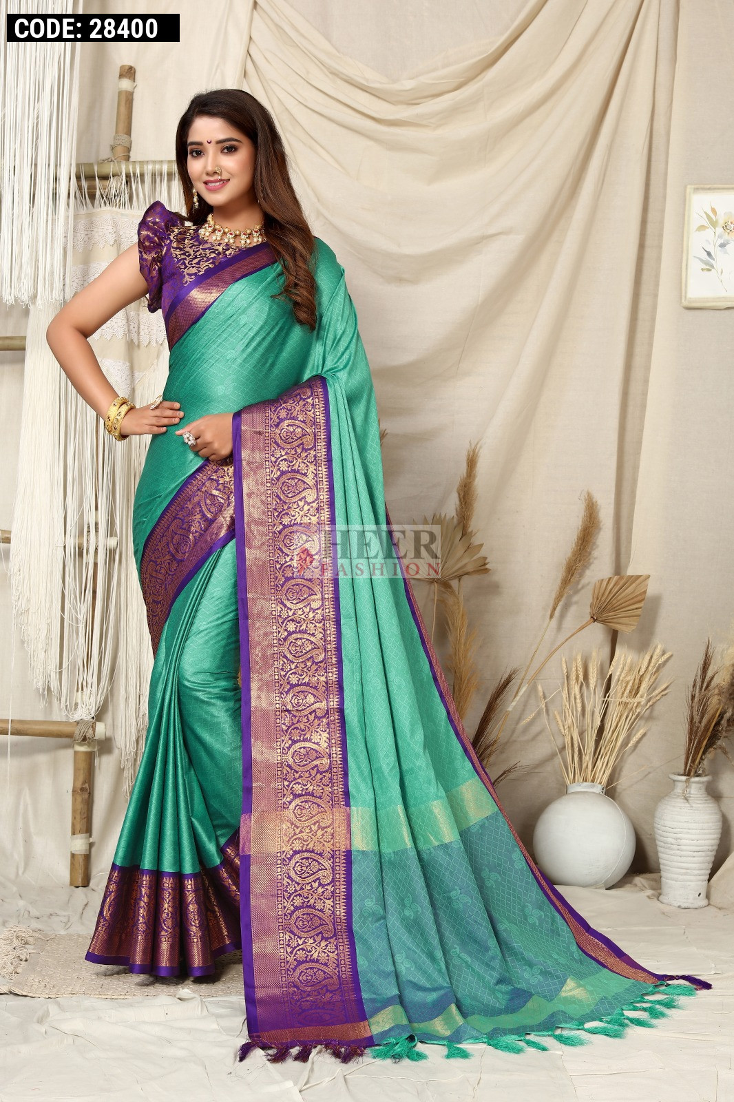 Rama green color soft cotton silk saree with woven design