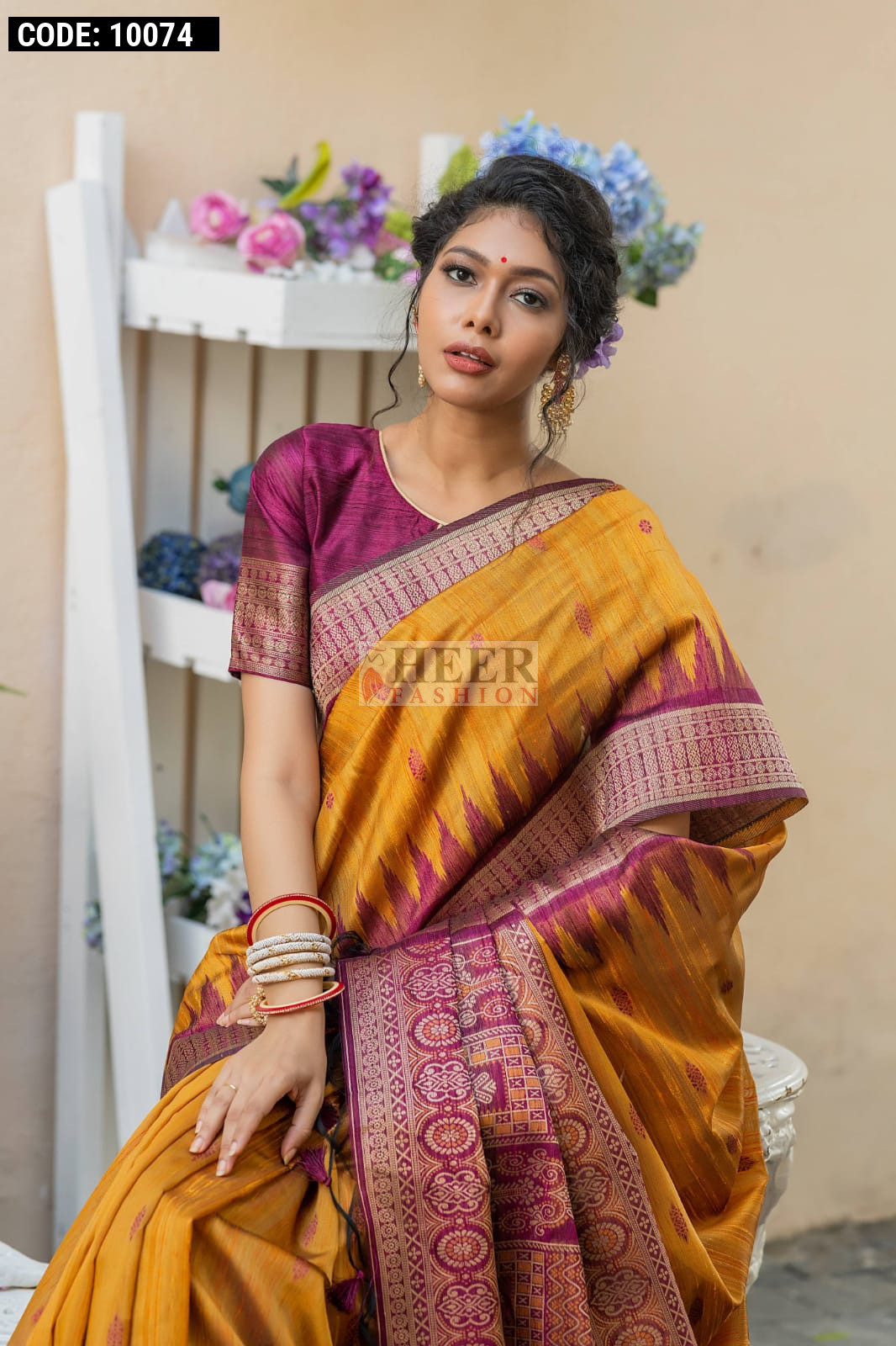 Mustard yellow color tussar silk saree with weaving work