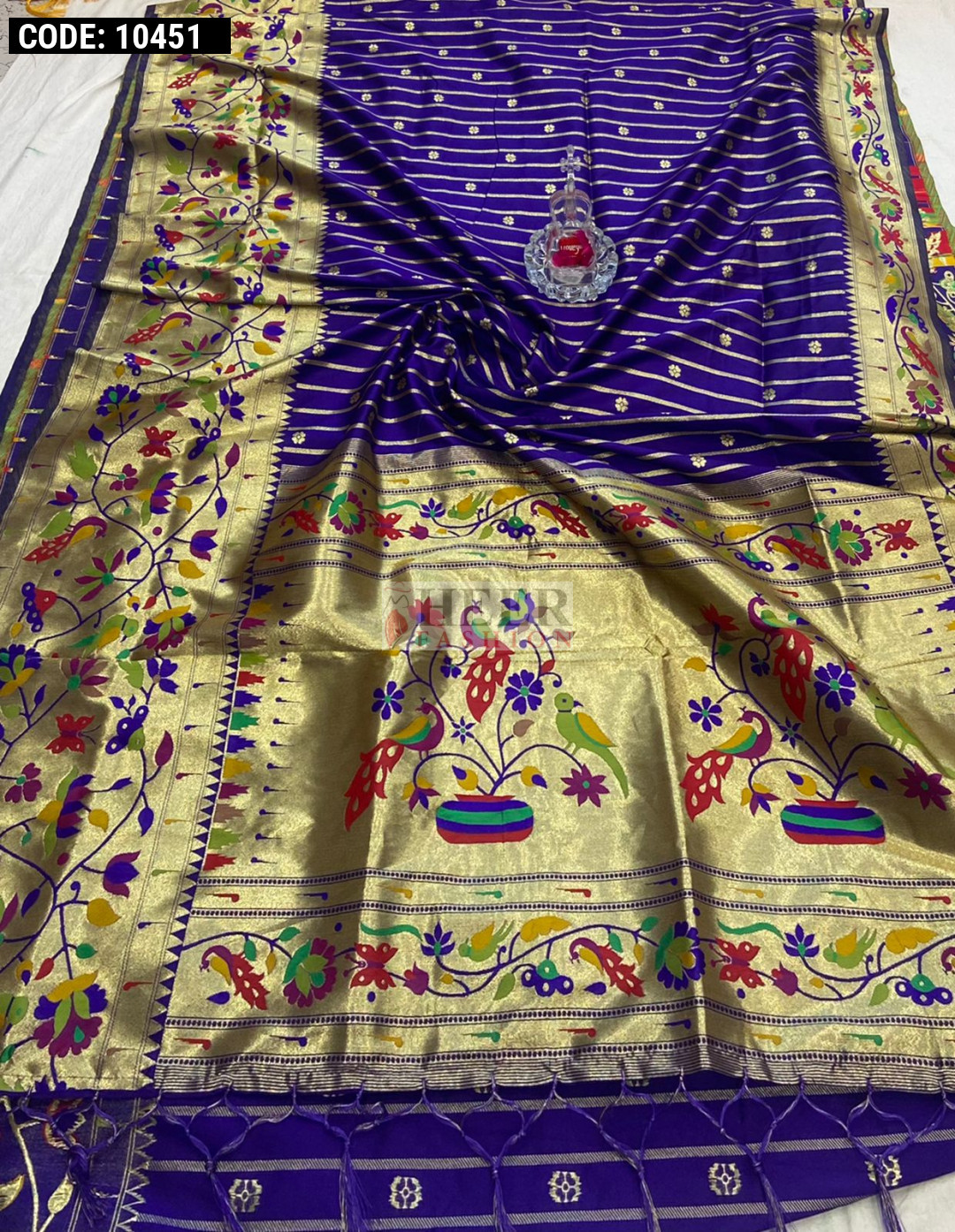 Violet color paithani silk saree with golden zari weaving work
