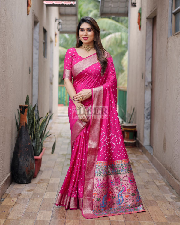 Rani pink color hand bandhej silk saree with zari weaving work