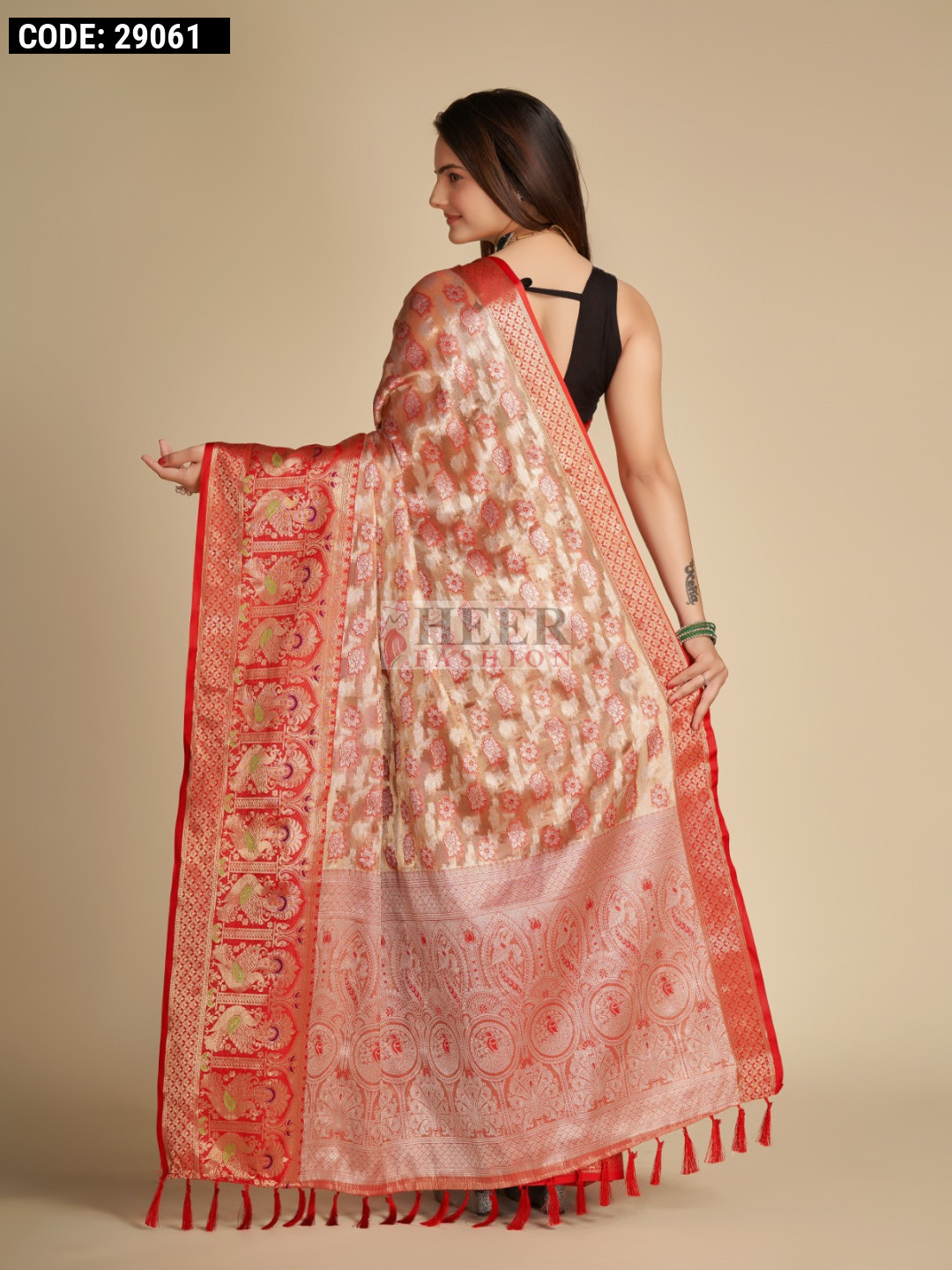 Red color tissue silk saree with woven design