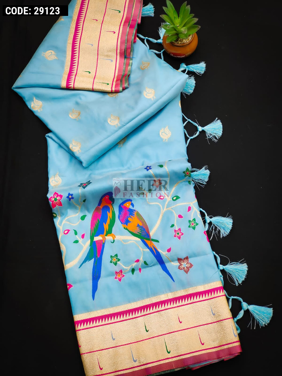 Sky blue color paithani silk saree with zari weaving work