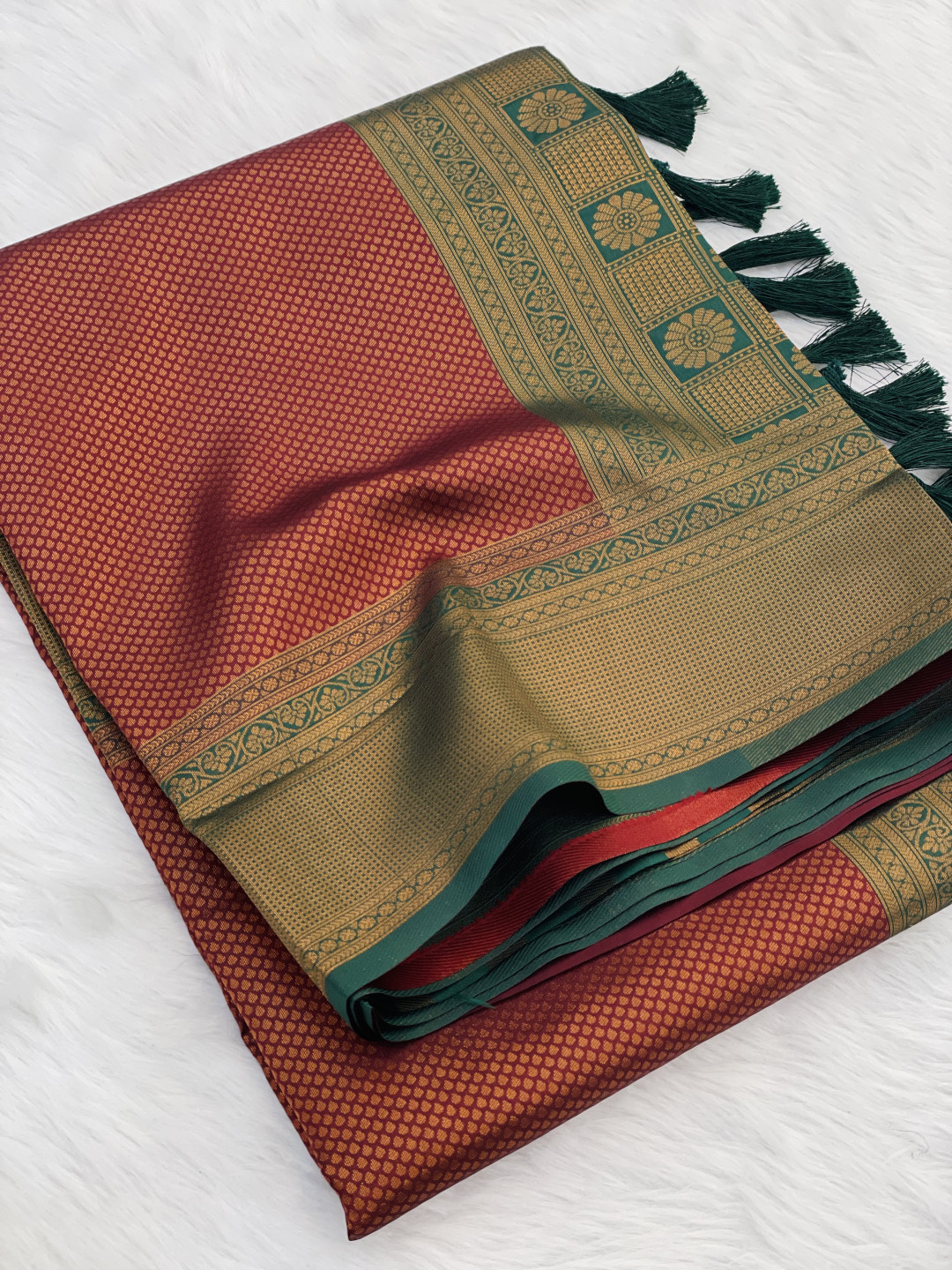 Maroon kubera pattu kanjivaram silk saree with zari weaving work
