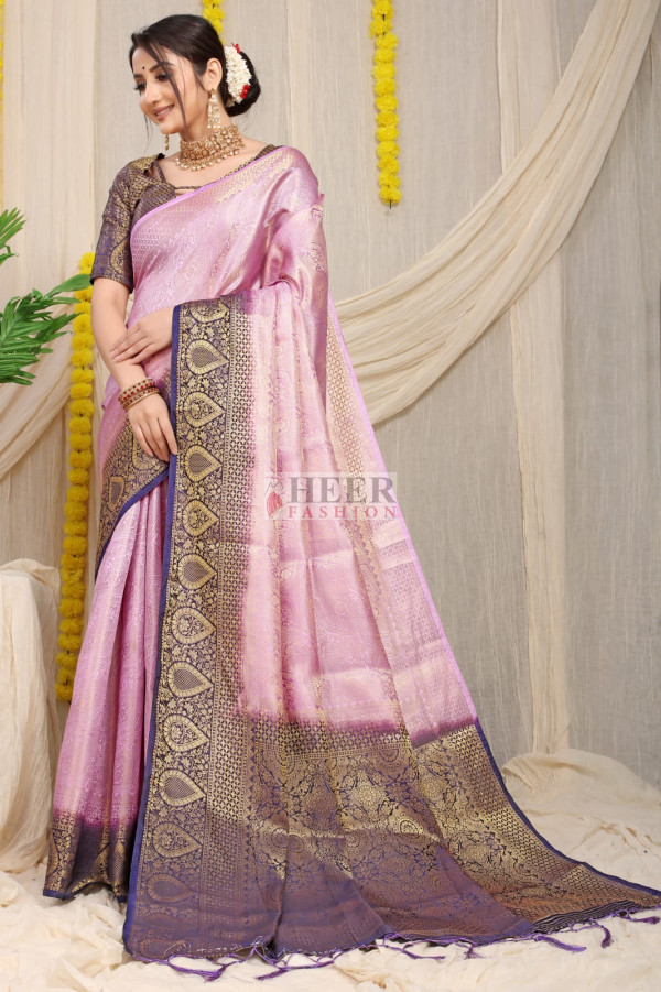Lavender color fancy silk saree with golden zari weaving work