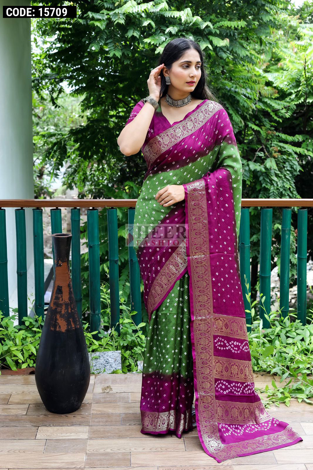 Mahendi Green and purple color bandhej silk saree with zari weaving work
