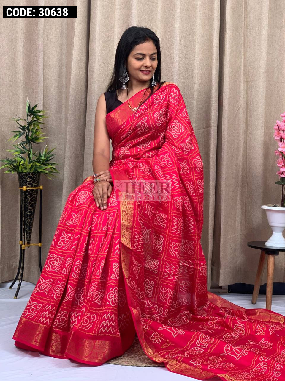 Red color tussar silk saree with bandhani printed work