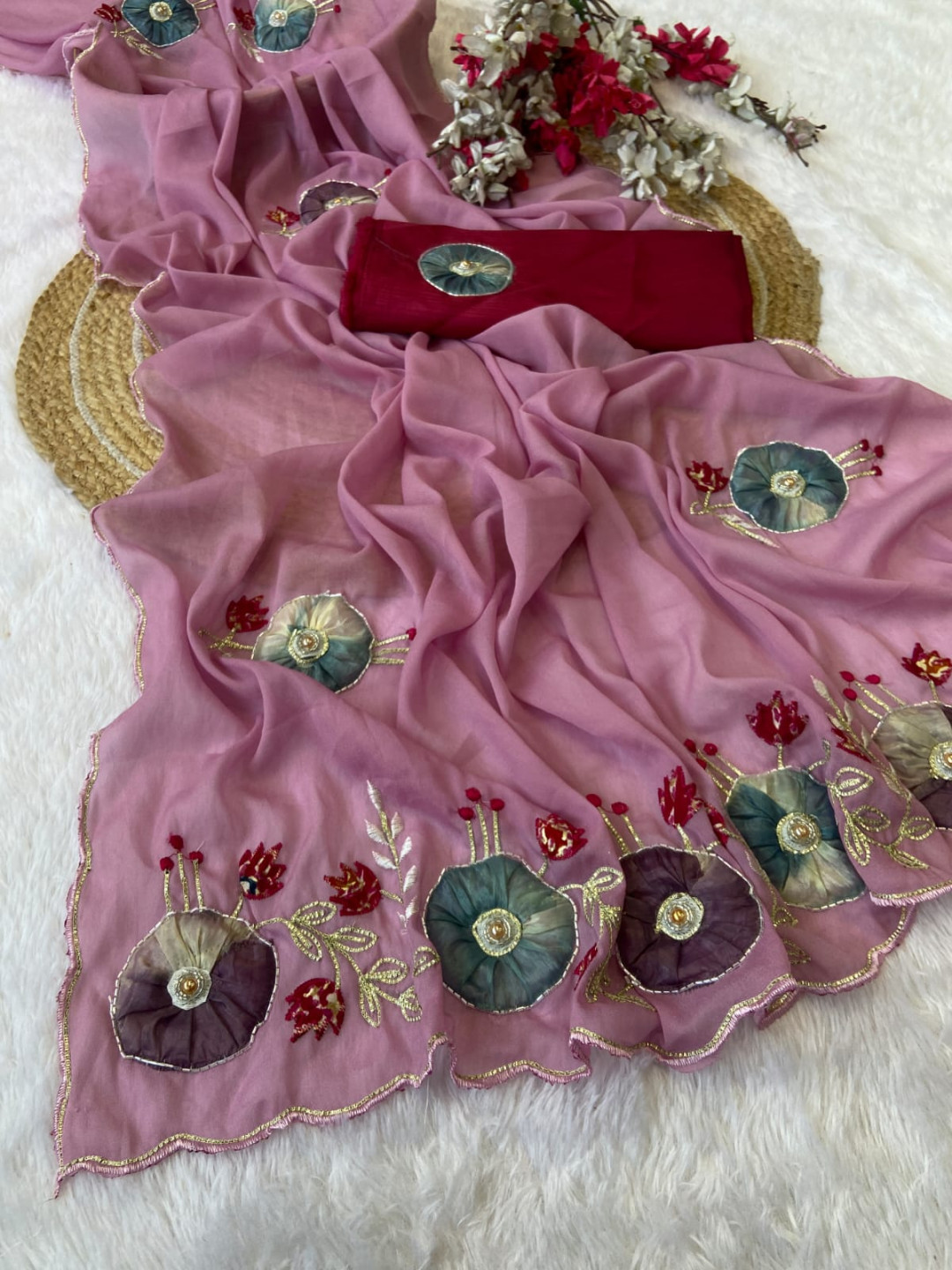 Baby pink color georgette saree with gota patti and moti work