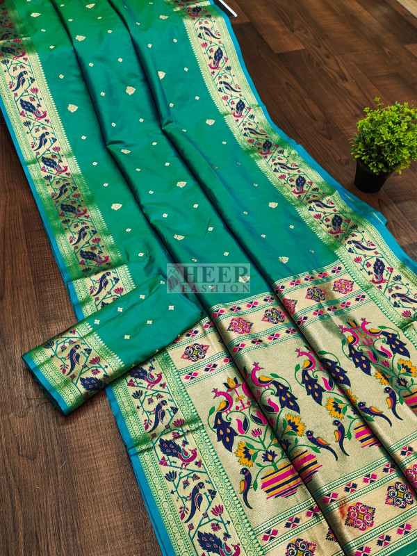 Rama green color paithani silk saree with zari weaving work