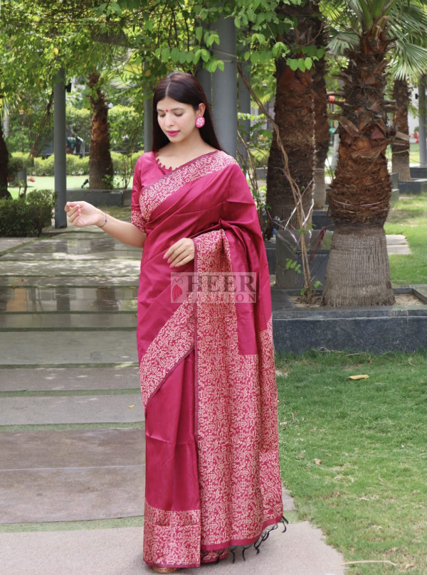 Pink color raw silk saree with woven design