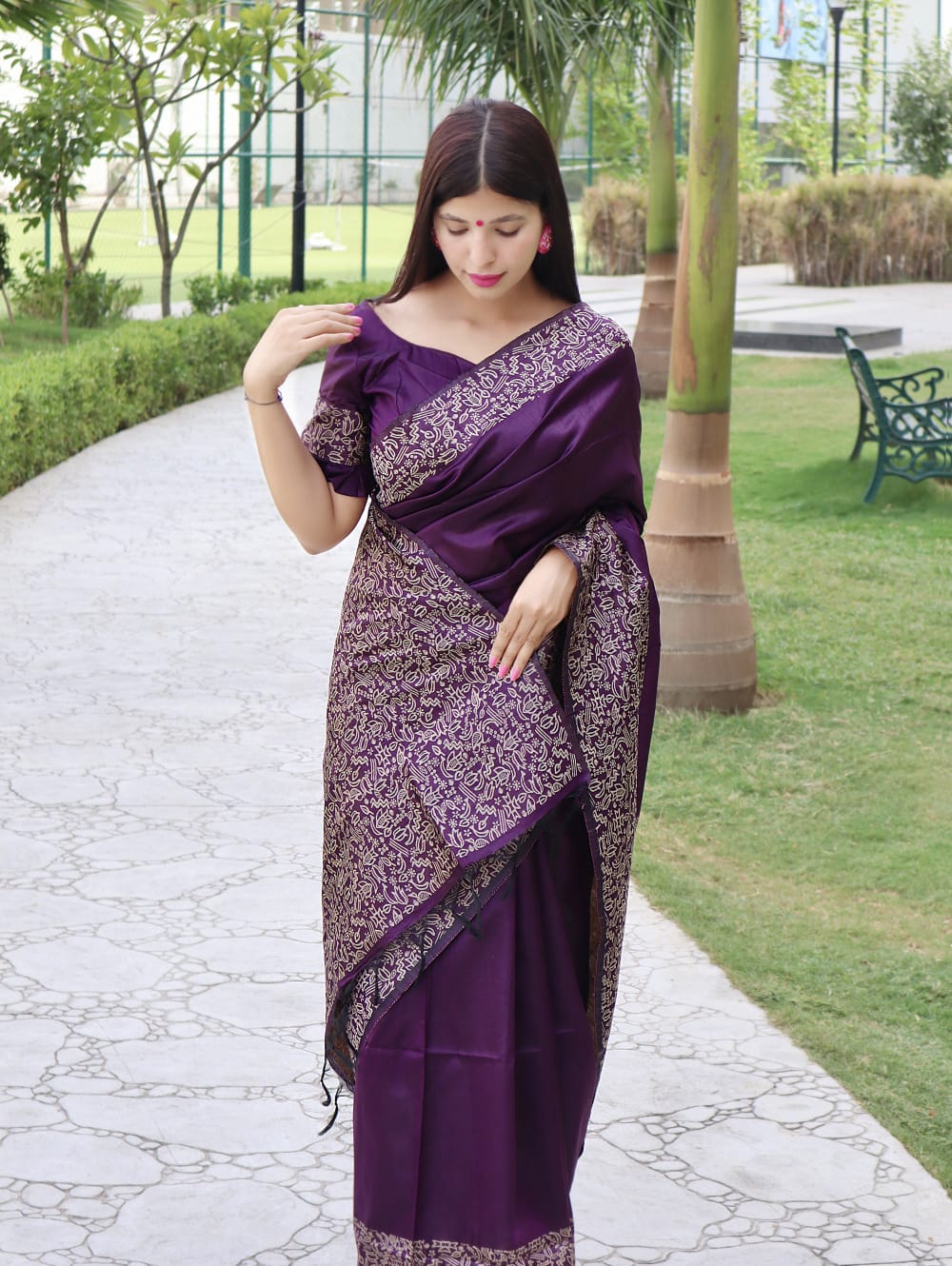 Magenta color raw silk saree with woven design