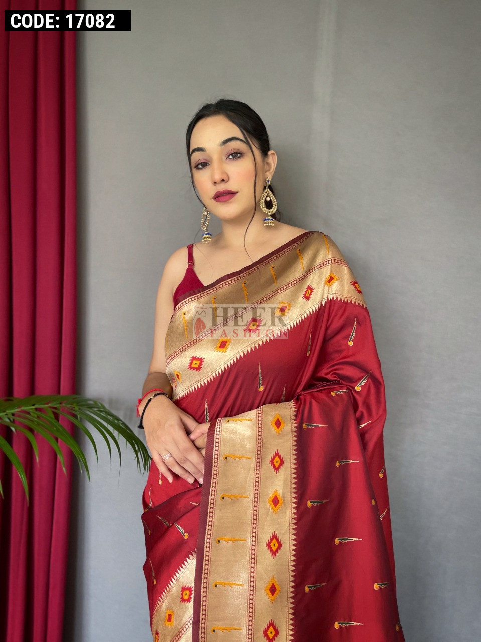 Maroon color paithani silk saree with zari weaving work